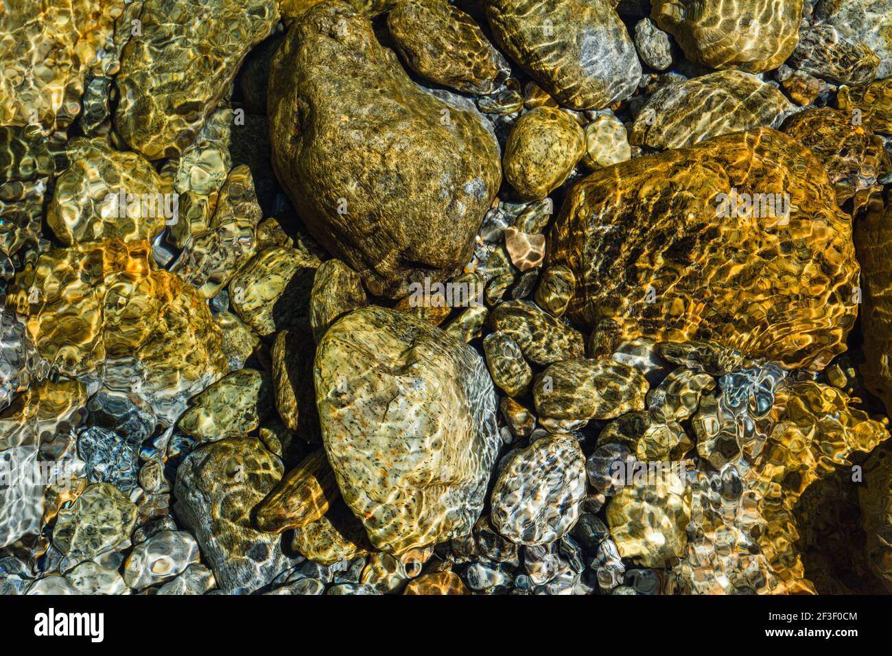 Stones under clear water. Stones, Rocks, Pebbles background.Summer ...