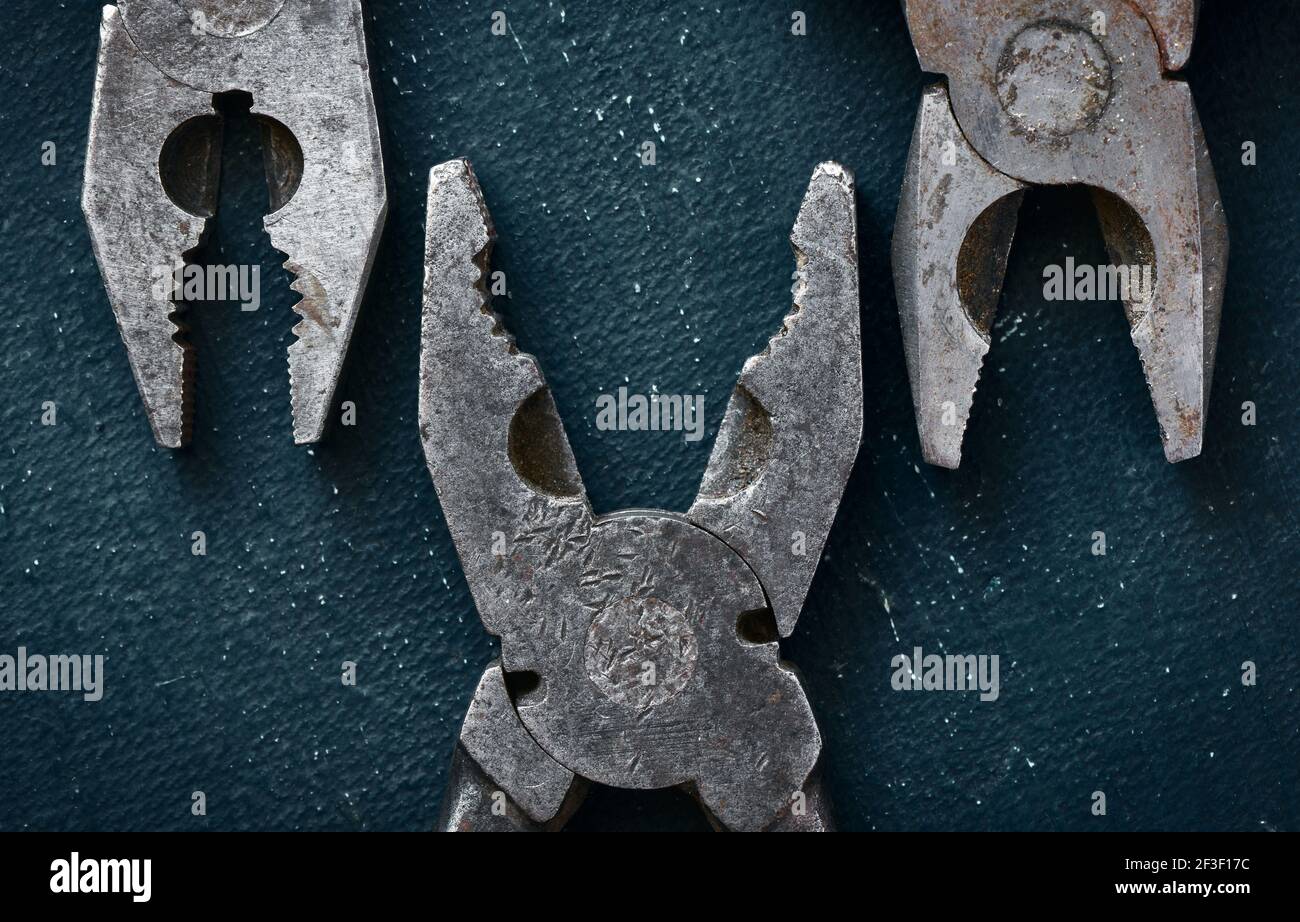 Old combination used pliers close-up, vintage styling, industry Stock ...