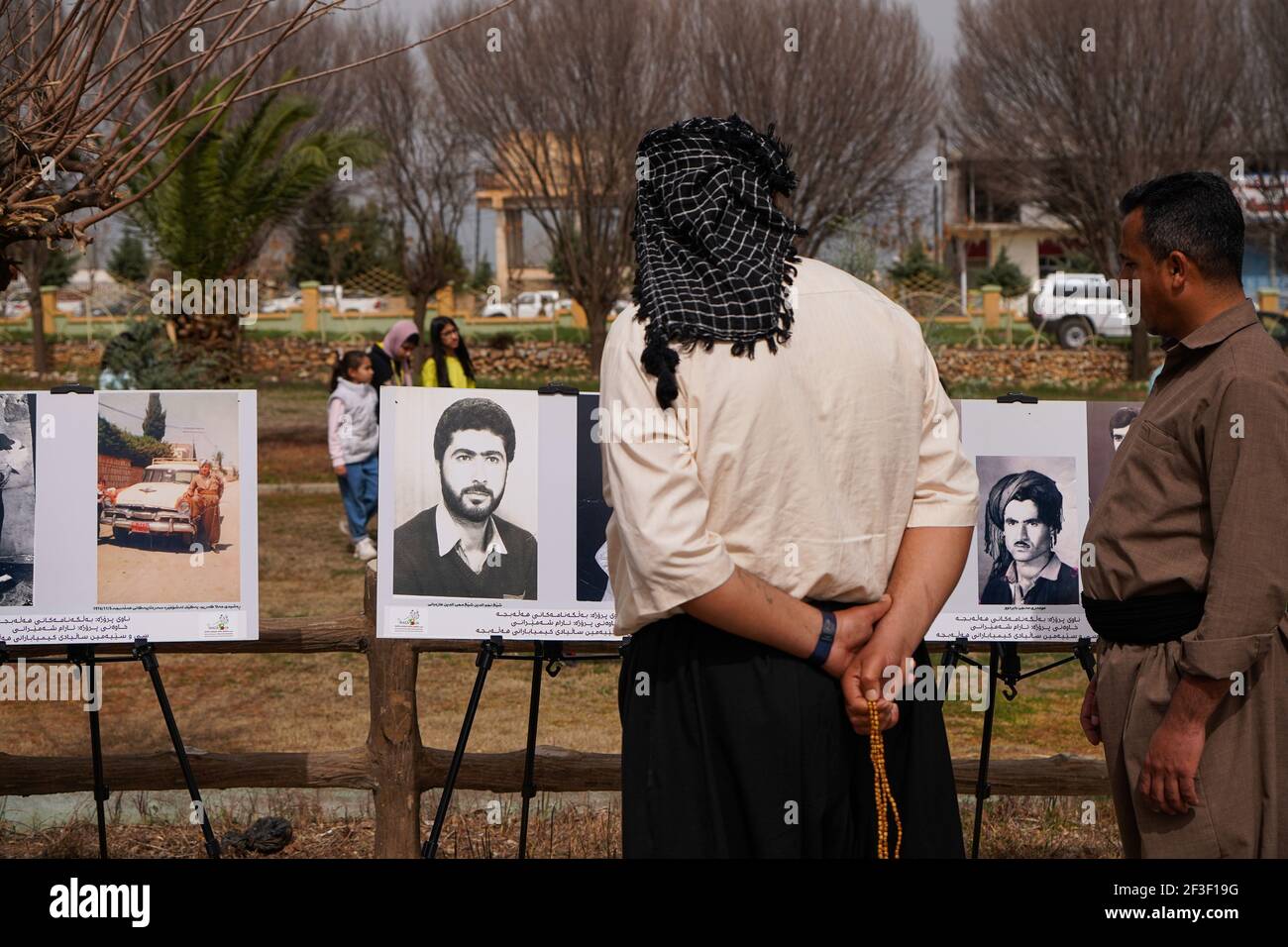 Iraqi Kurds view pictures of the victims of the Halabja chemical attack ...