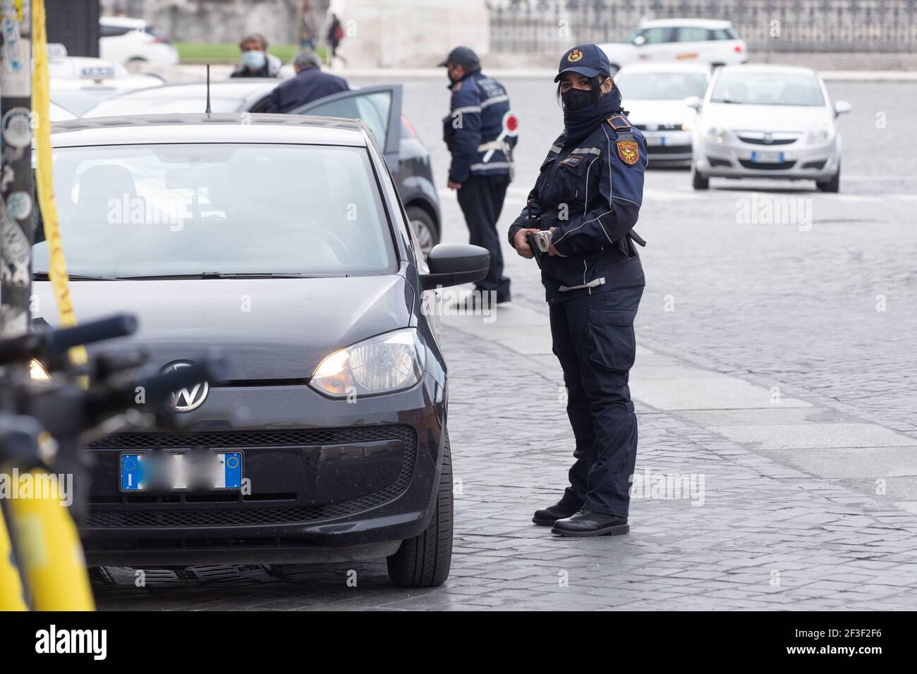 Rome, Italy. 16th Mar, 2021. Traffic Police check the cars passing ...
