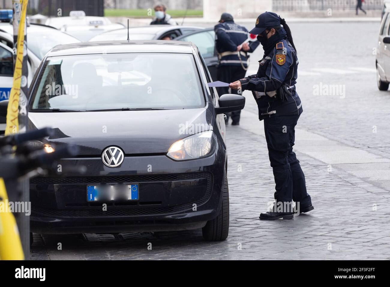 Rome, Italy. 16th Mar, 2021. Traffic Police check the cars passing ...