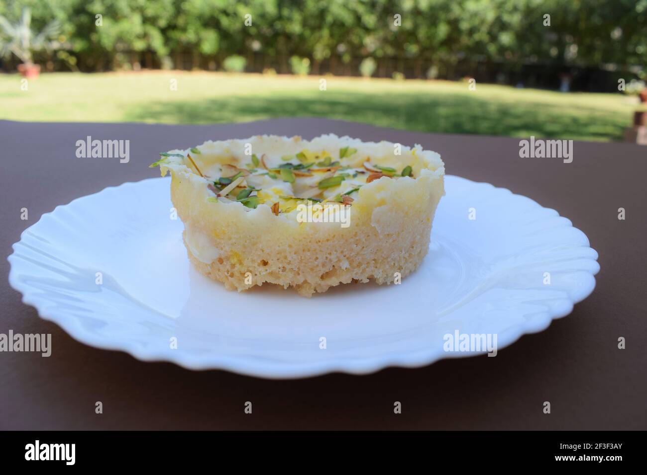 Traditional and authentic halwai style Indian sweet dish called Ghevar ...