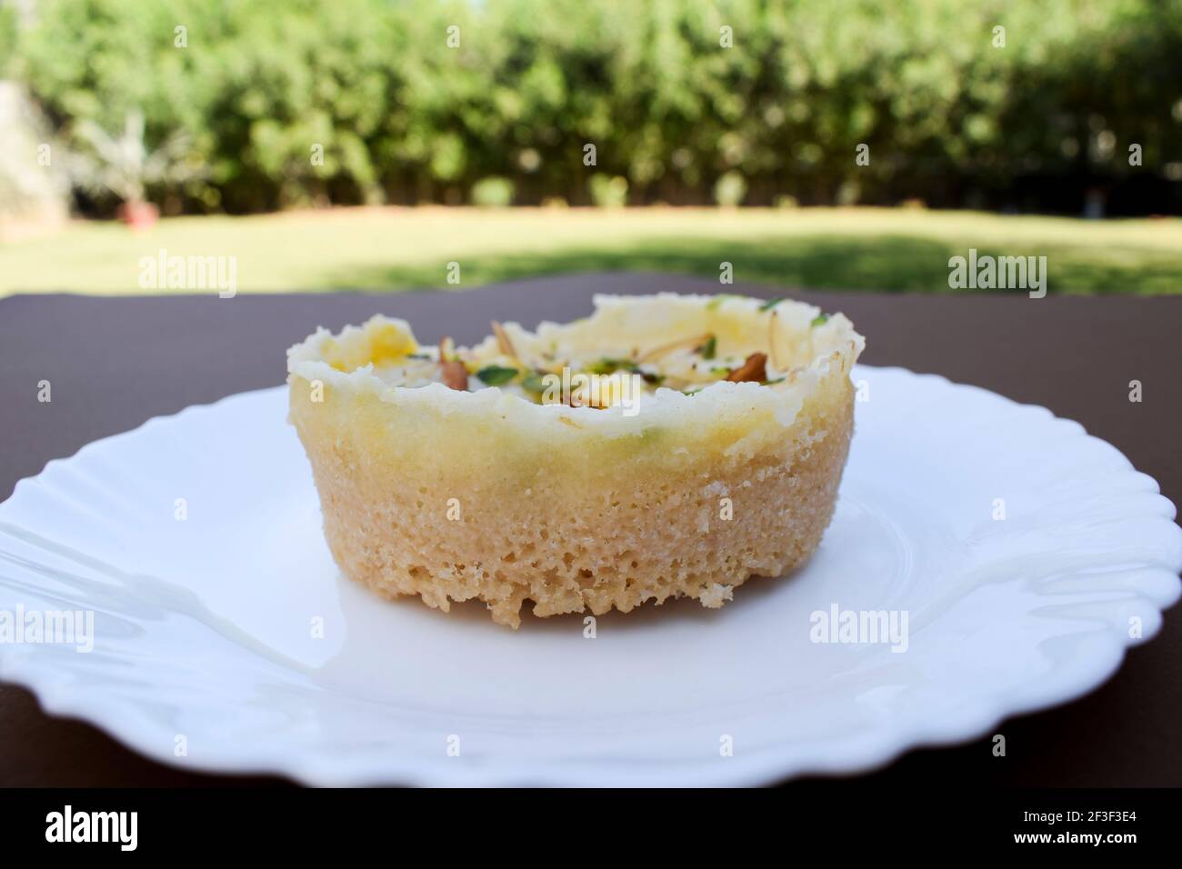 Traditional and authentic halwai style Indian sweet dish called Ghevar ...