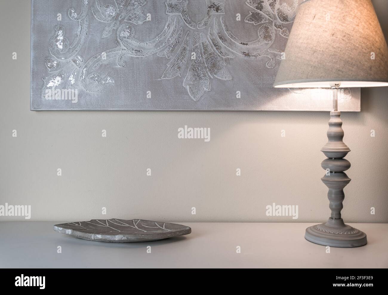 Silver interior stand with lamp and plate Stock Photo - Alamy
