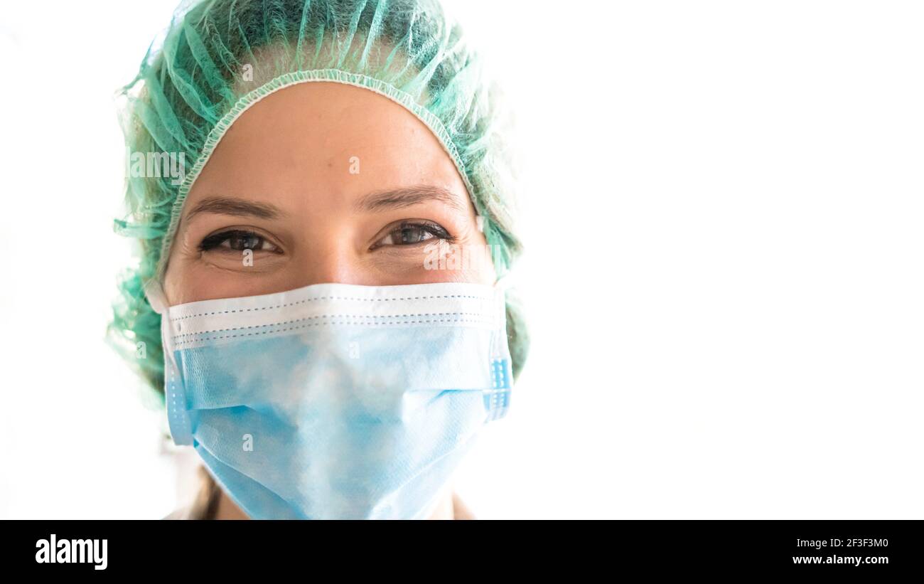 Young medical professional smile with procedure mask on her face Stock ...