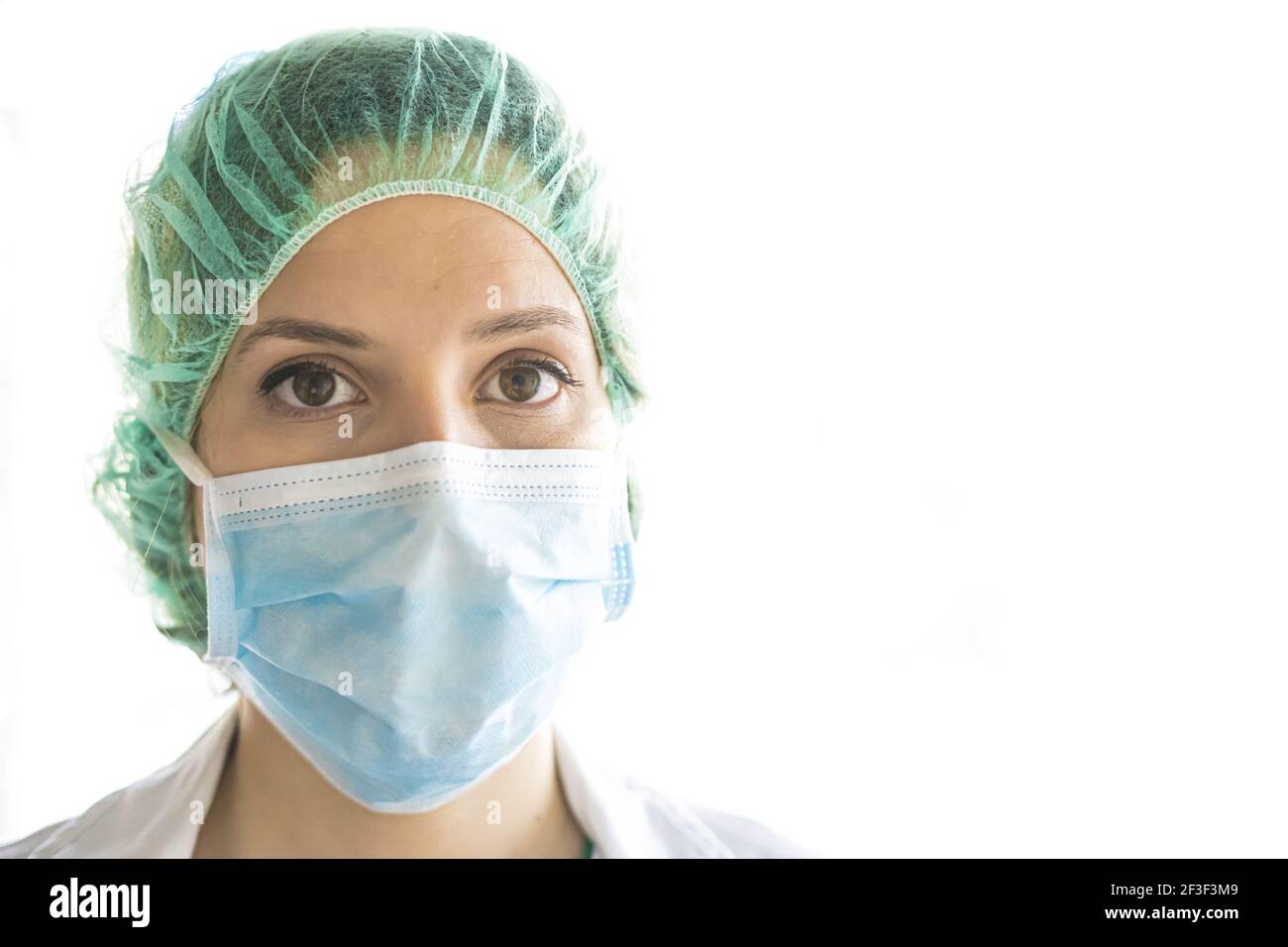 A shallow focus closeup of a female medical professional wearing a ...