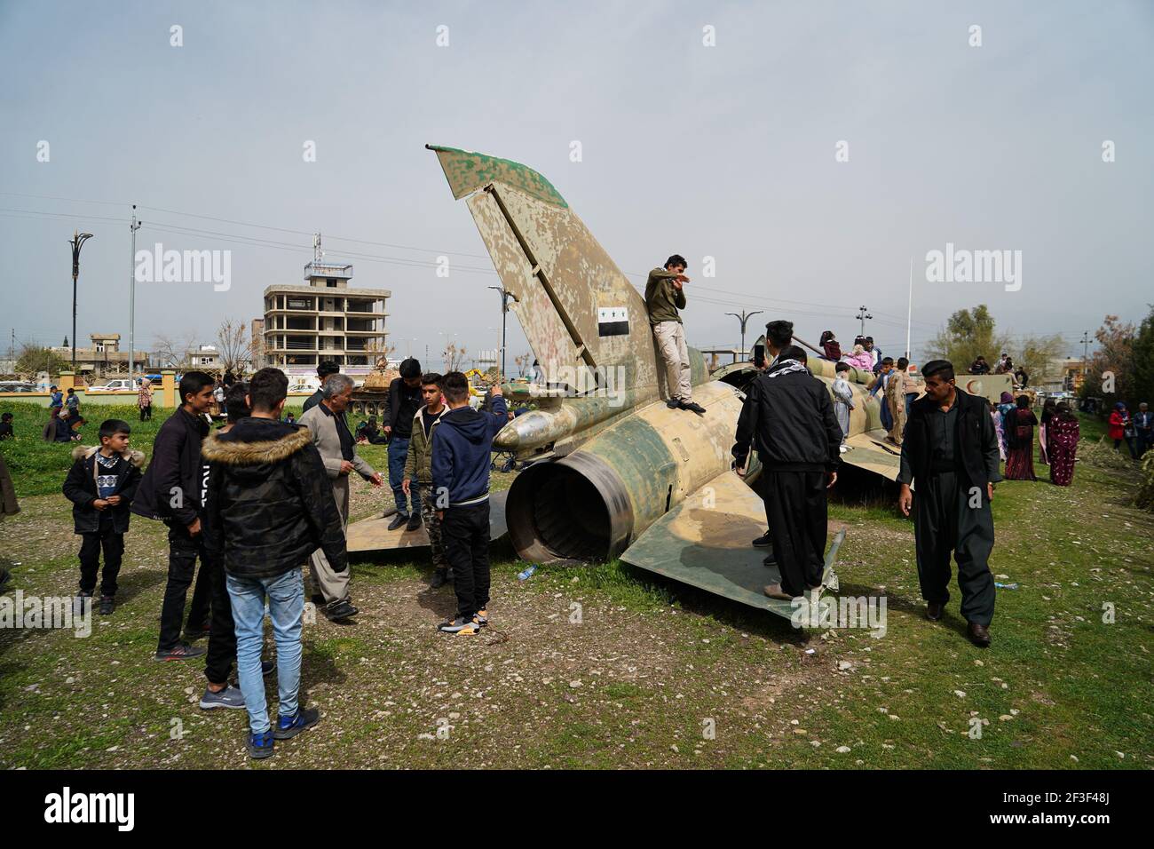 Halabja, Iraq. 16th Mar, 2021. People seen around the military plane ...