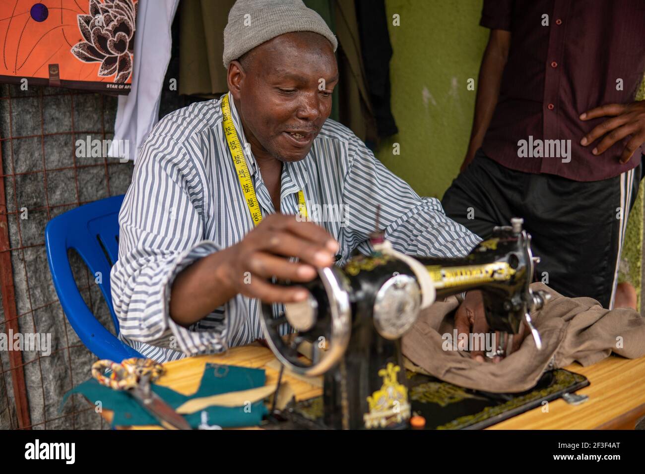 African man sewing machine in hi-res stock photography and images - Alamy