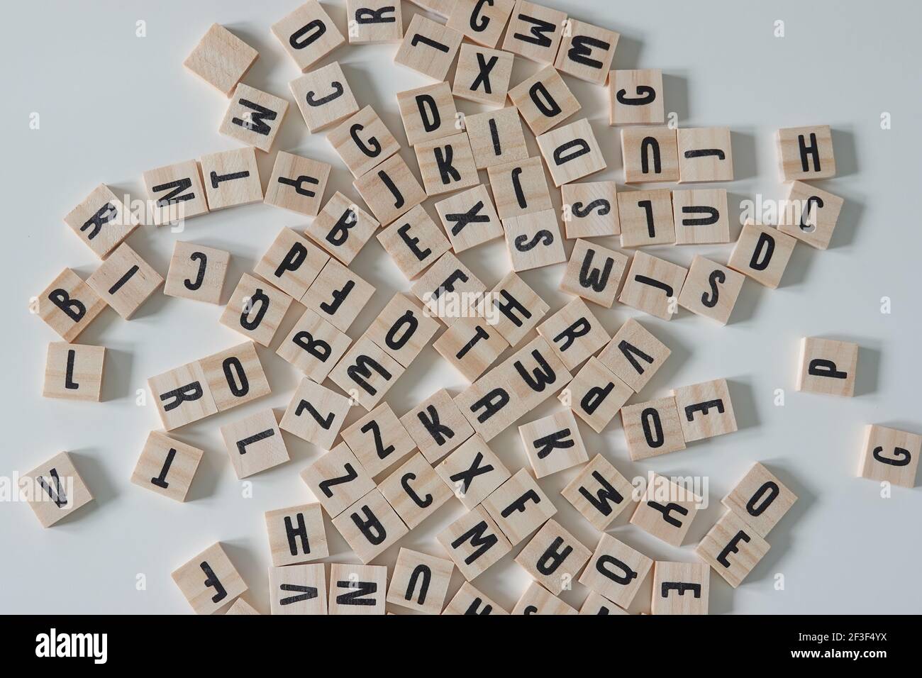 Wooden letters on a white back ground. Concept education, business, and ...
