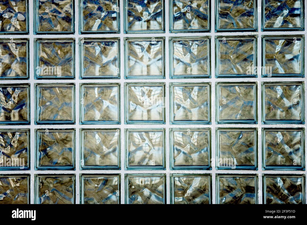 decorative reflections on glass blocks. pattern background Stock Photo ...