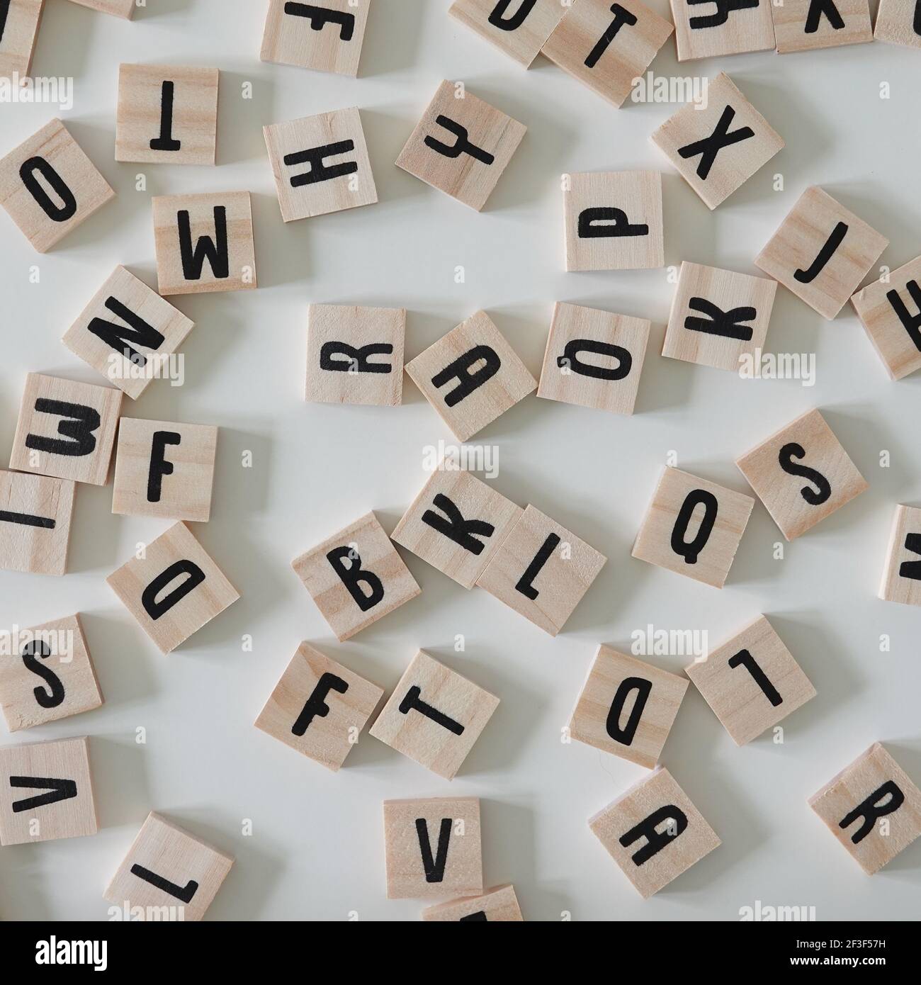 Wooden letters on a white back ground. Concept education, business, and ...