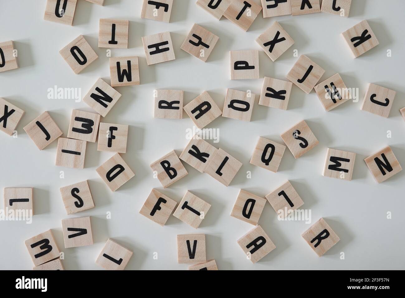 Wooden letters on a white back ground. Concept education, business, and ...