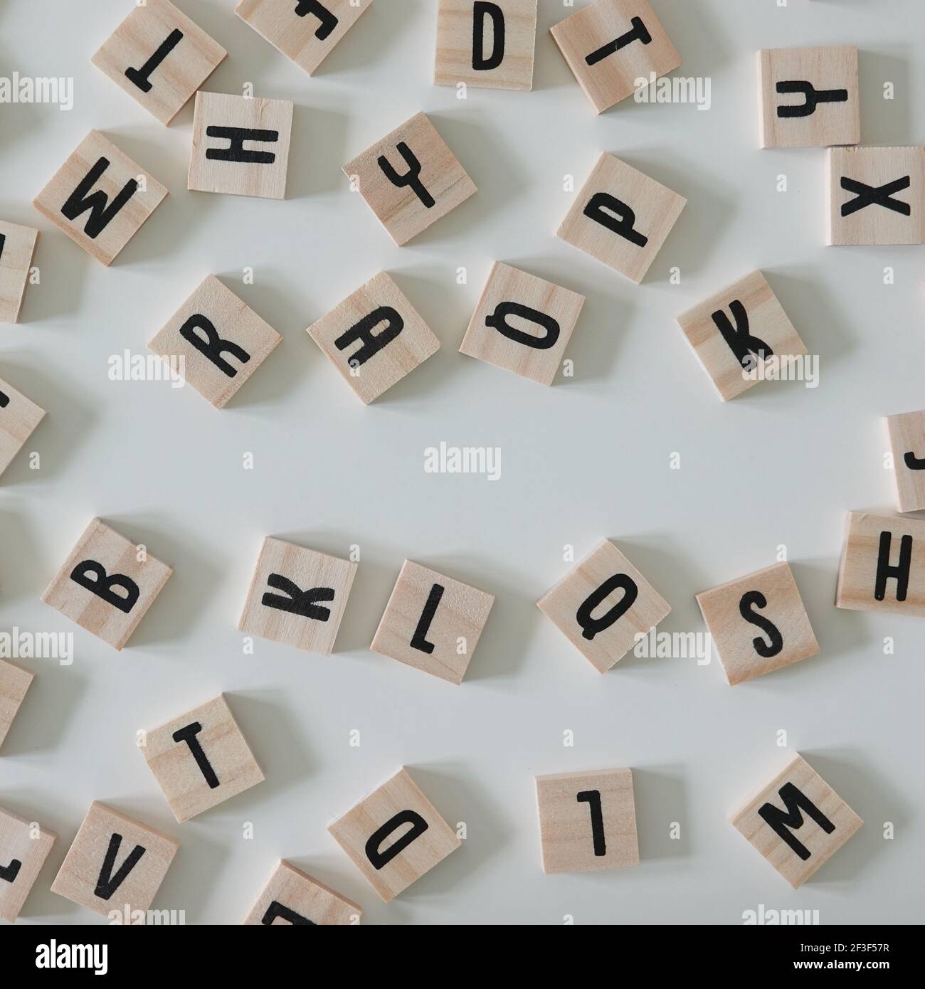 Wooden letters on a white back ground. Concept education, business, and ...