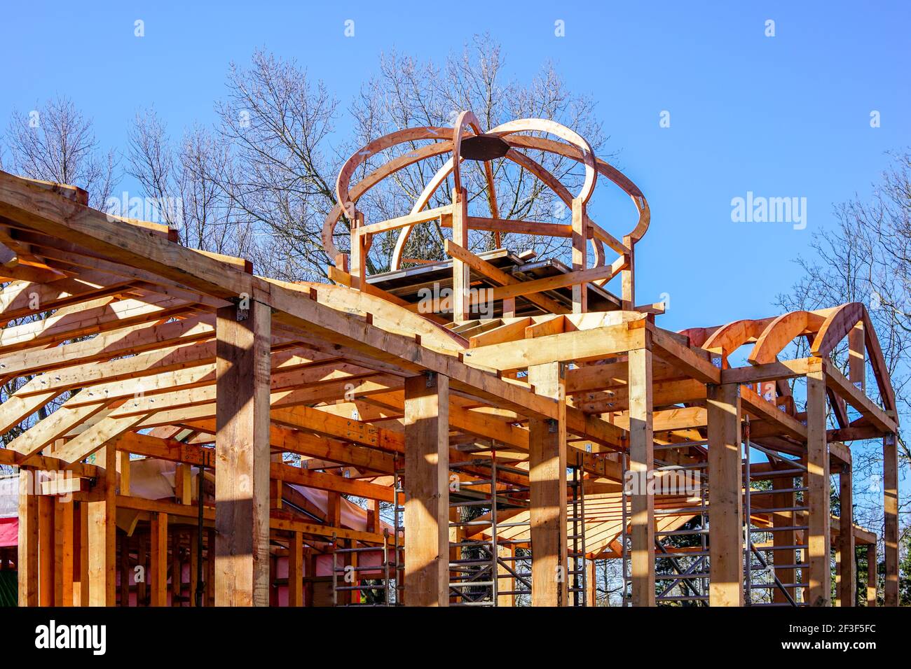 new wooden building frame with a round domed tower frame Stock Photo ...