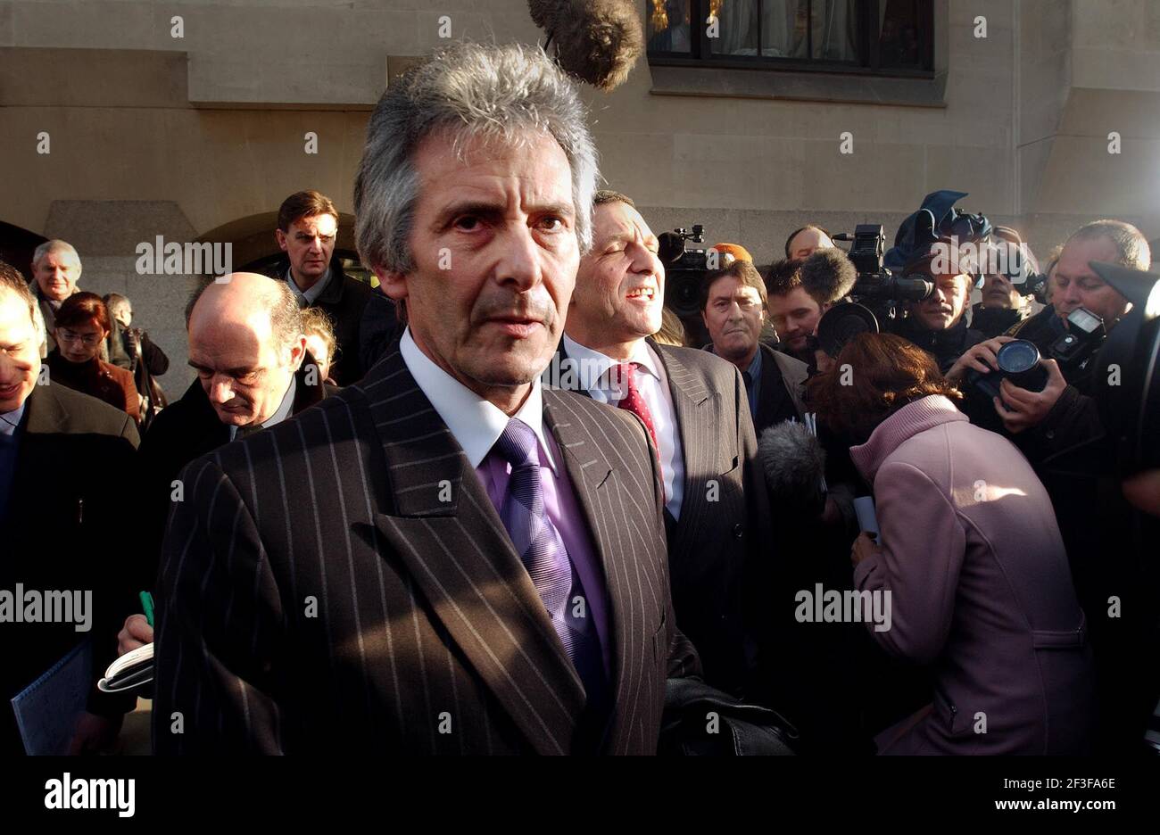 NICHOLAS VAN HOOGSTRATAN WALKS FREE FROM THE OLD BAILEY.9/12/03 PILSTON ...