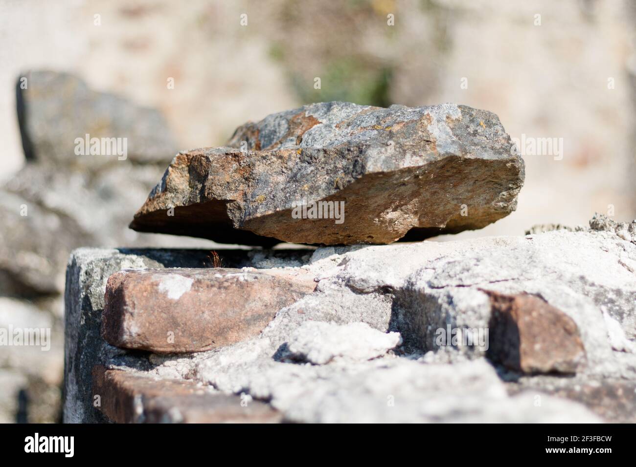 A closeup of a stone with sun rays falling on it Stock Photo - Alamy