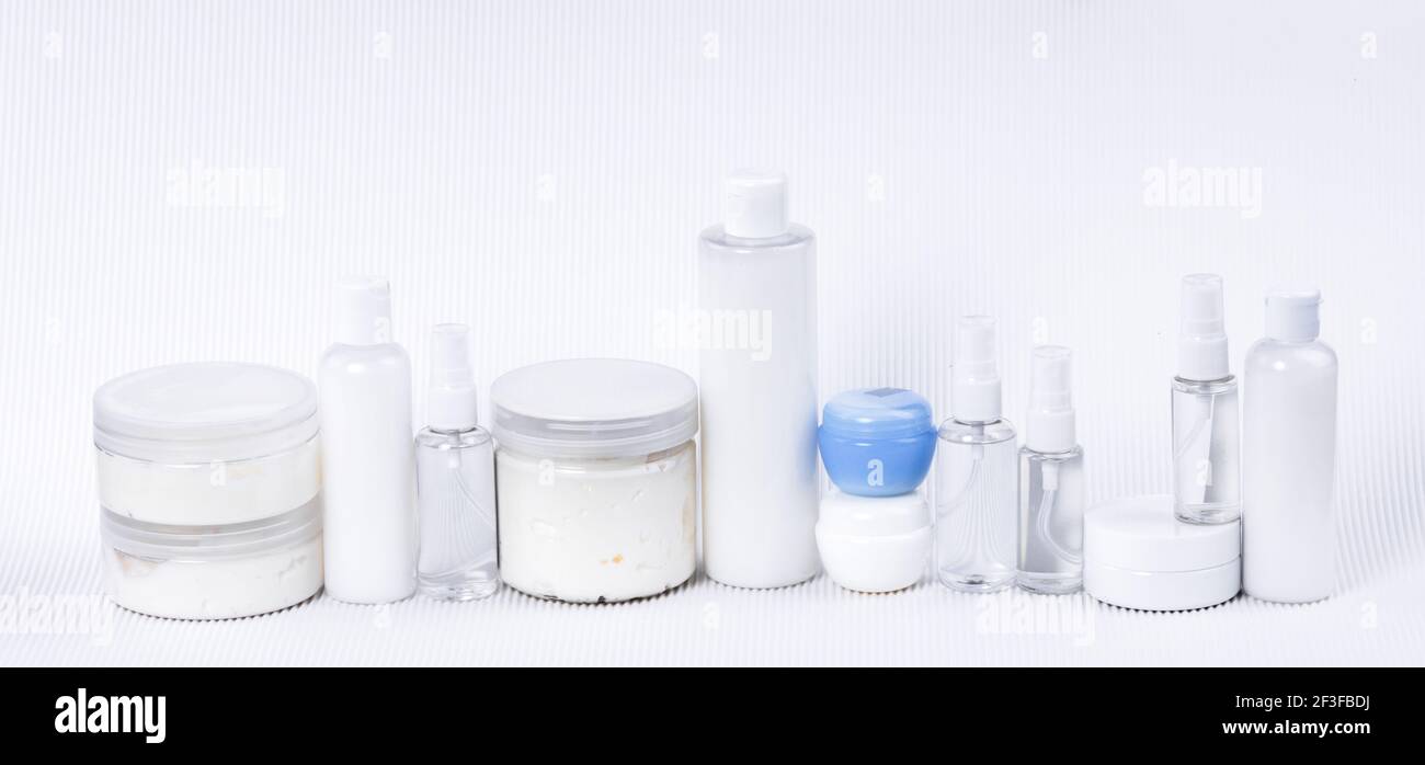 Plastic containers with cream without labels for brand advertising on a ...