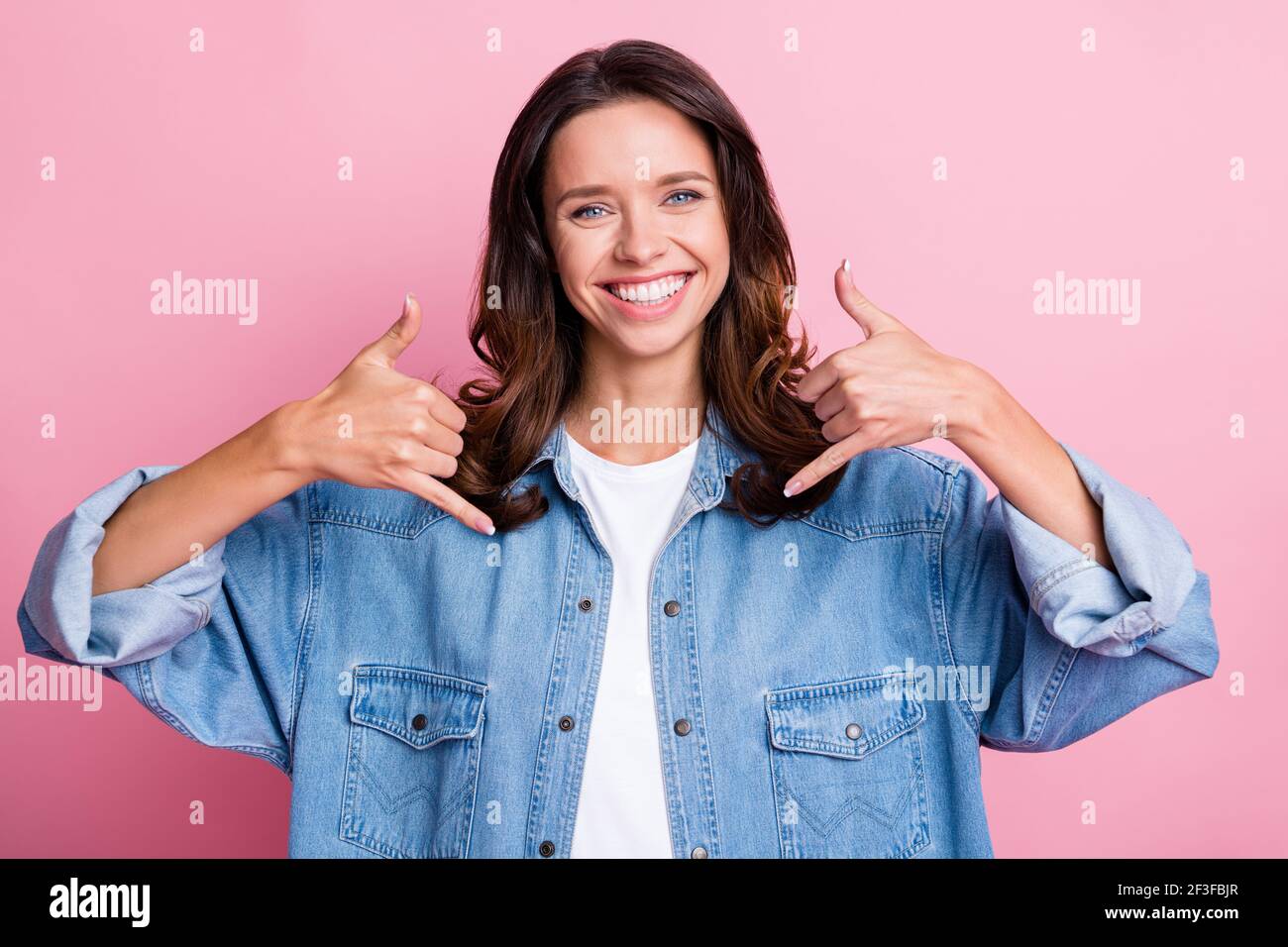 Photo of happy attractive young lady make call phone signs beaming ...