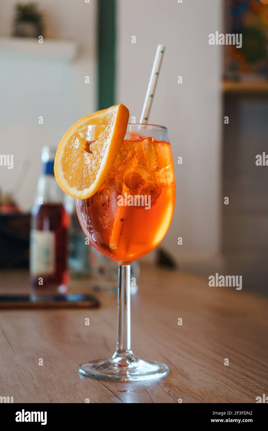 A vertical shot of a drink with orange Stock Photo - Alamy