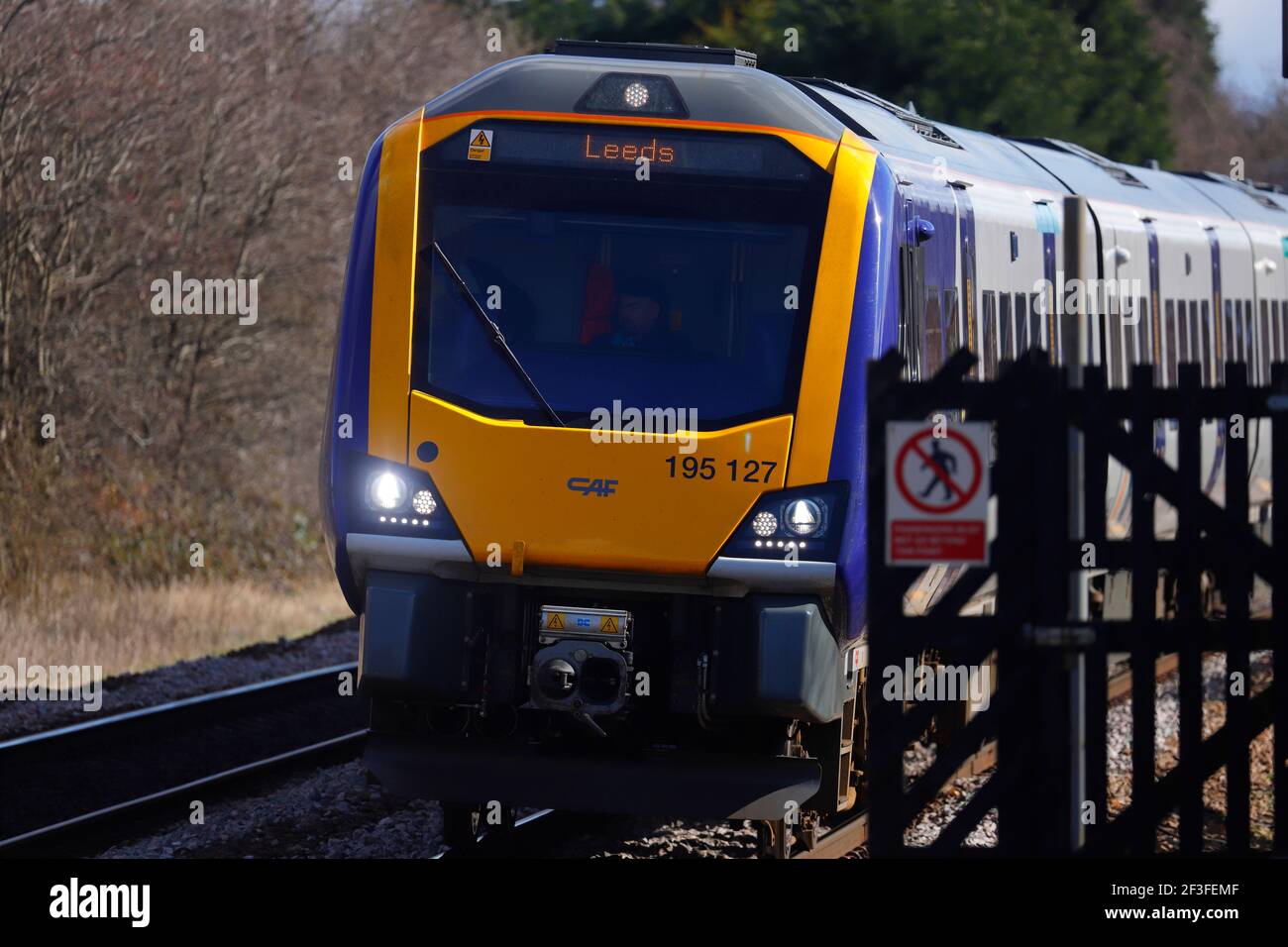 Rail Class 195 train by Northern Rail running through Garforth Station ...