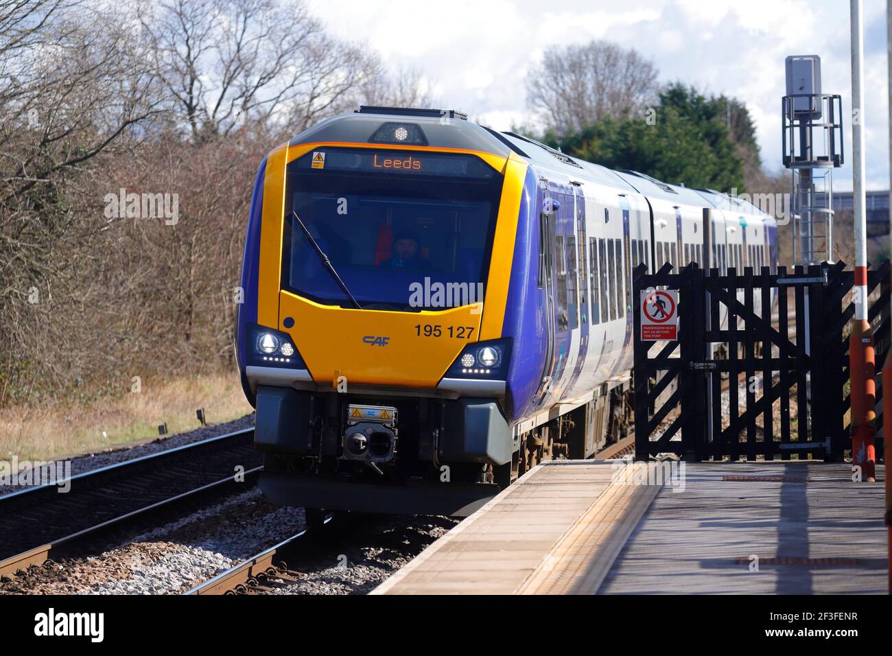Rail Class 195 train by Northern Rail running through Garforth Station ...