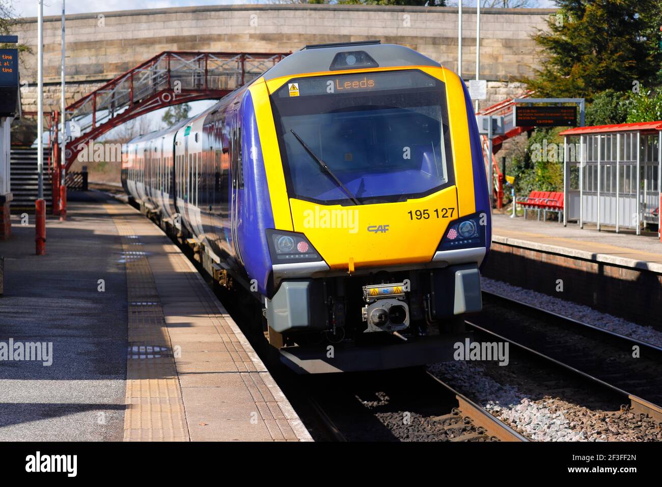 Rail Class 195 train by Northern Rail running through Garforth Station ...