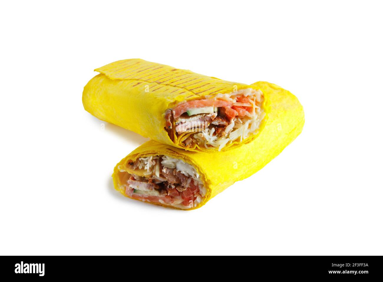 Two crossed pars of Greek cheesy shawarma with layers of chicken meat ...