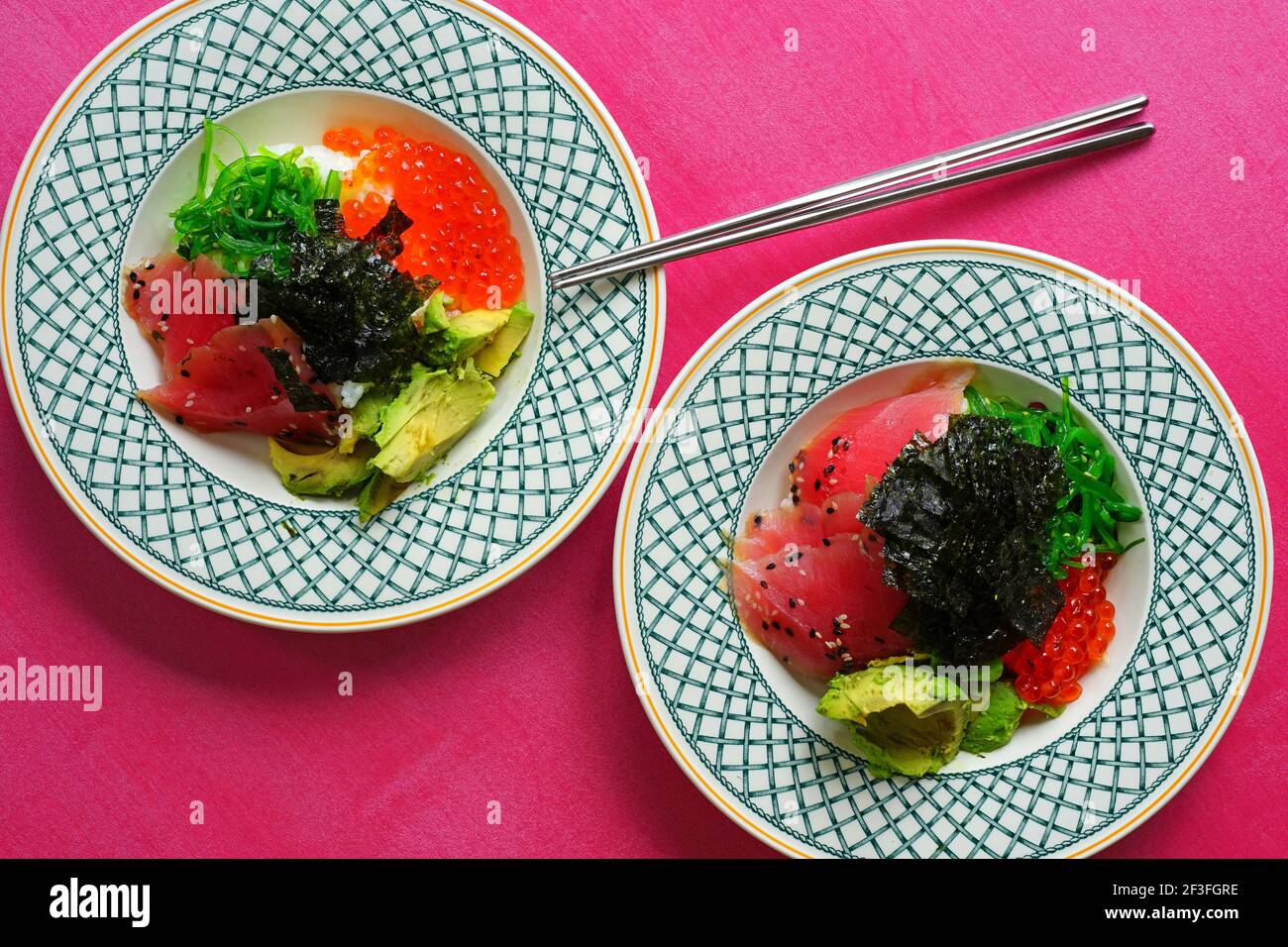 Asian green rice bowl with smoked Ahi tuna slices, salmon roe, cucumber ...