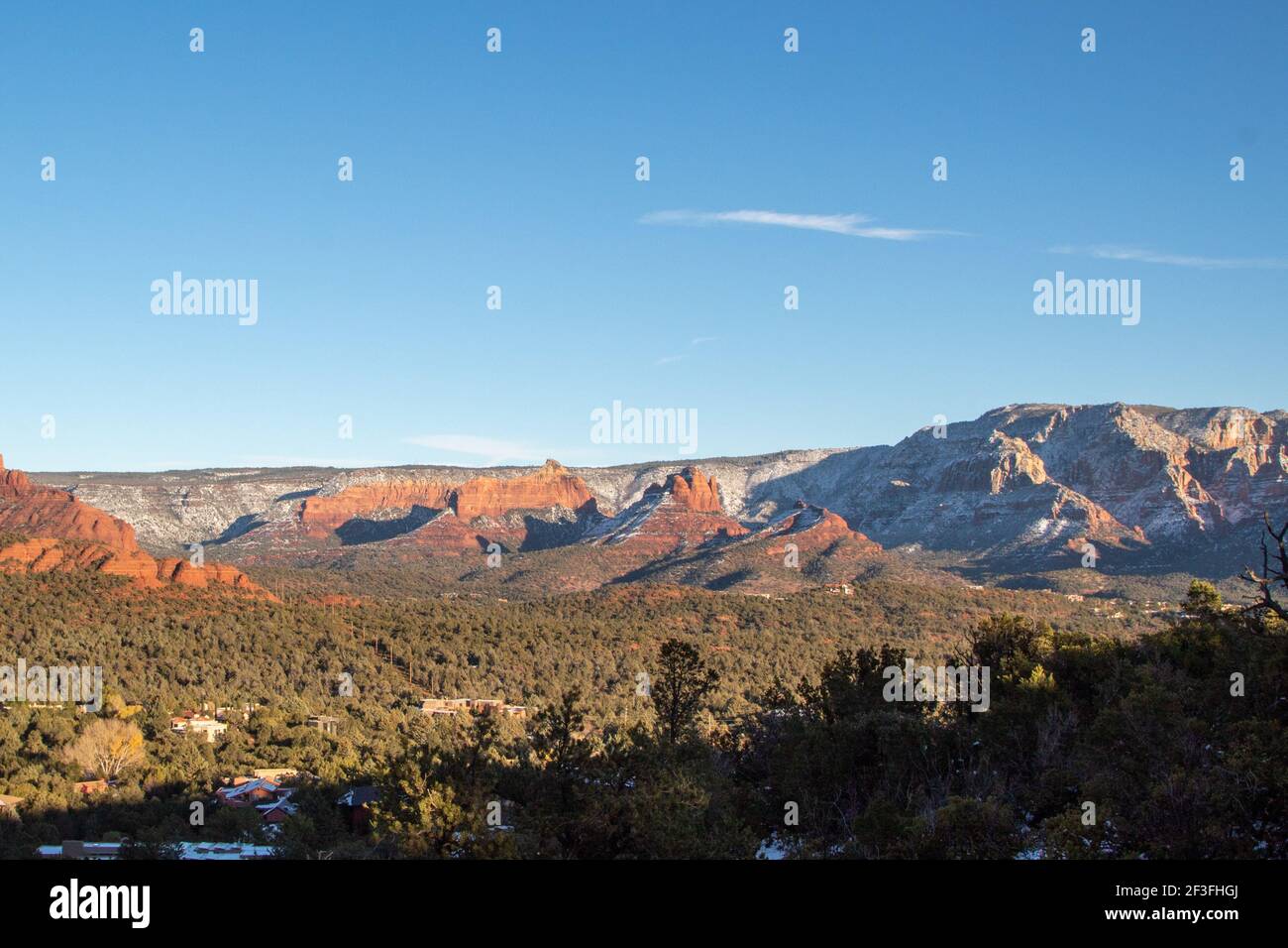 An aerial view of rocky mountains with trees in the foreground Stock ...