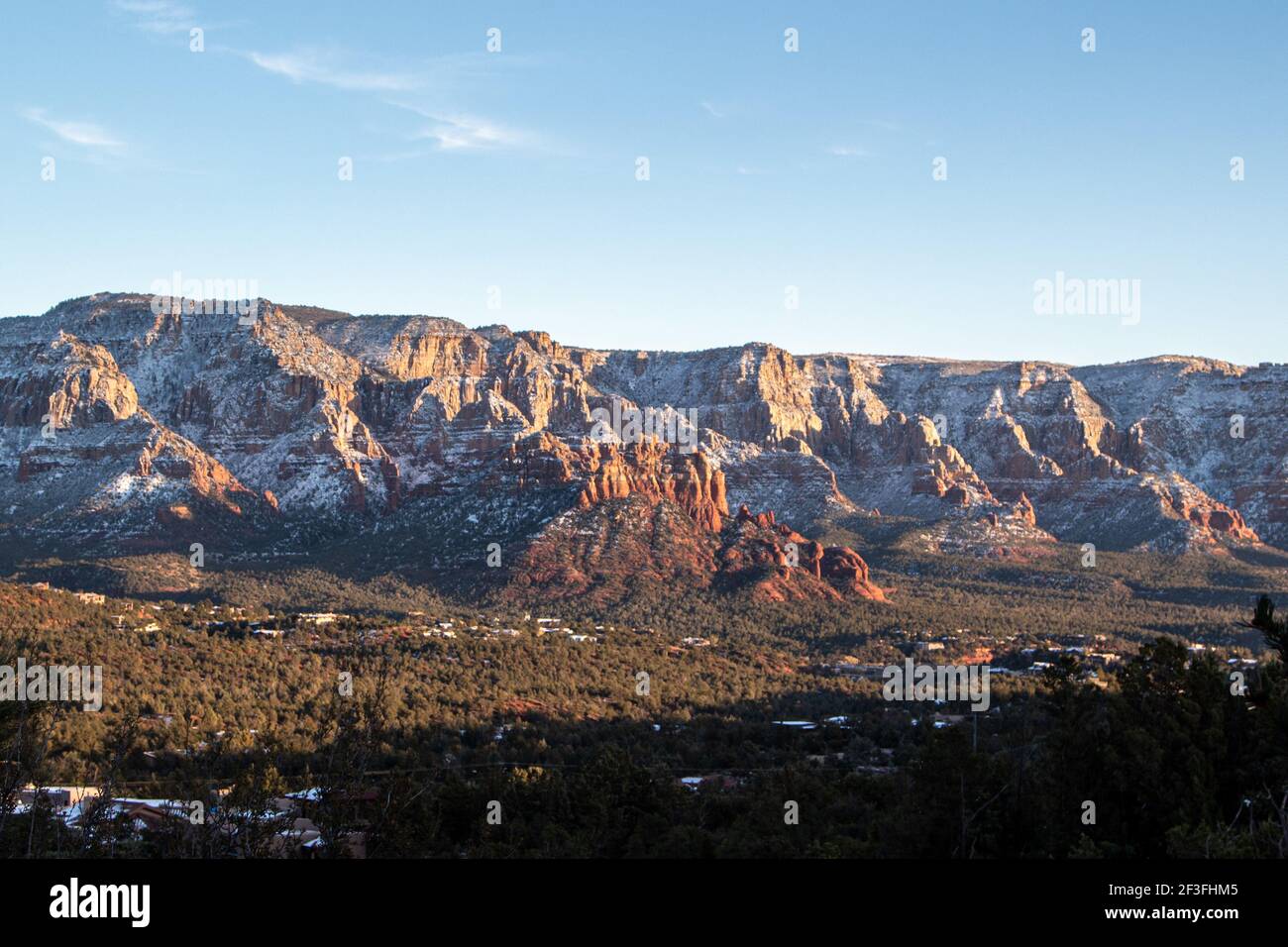 An aerial view of rocky mountains with trees in the foreground Stock ...