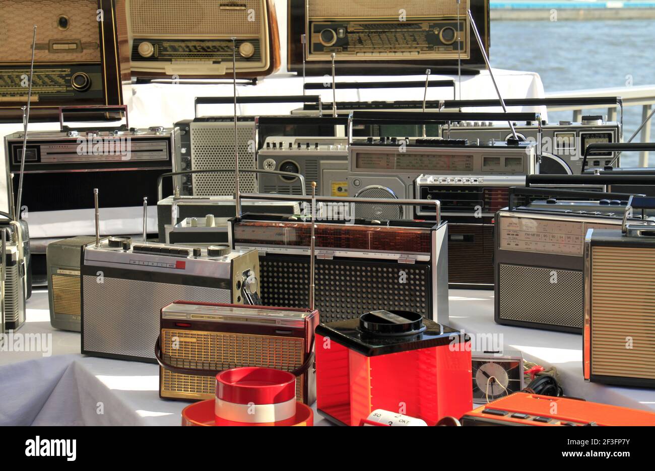 The numerous old radios on a flea market Stock Photo - Alamy