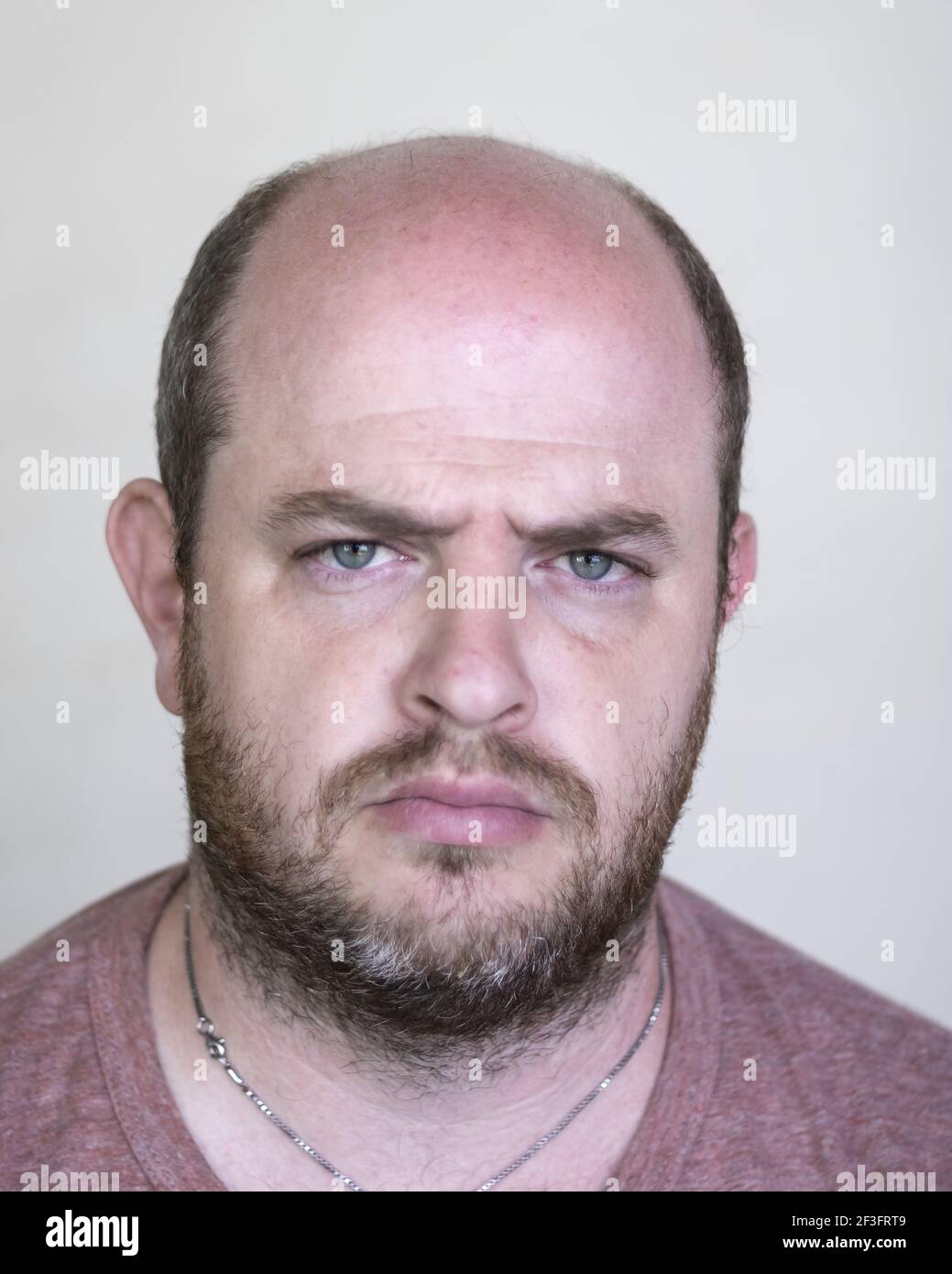 Angry guy making face hi-res stock photography and images - Alamy