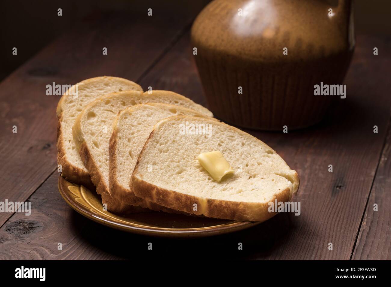 Slice of bread and butter hi-res stock photography and images - Alamy