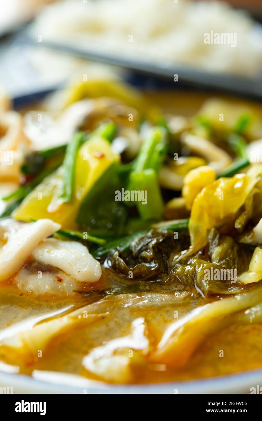 angle view fast food of spicy boiled fish with rice vertical ...