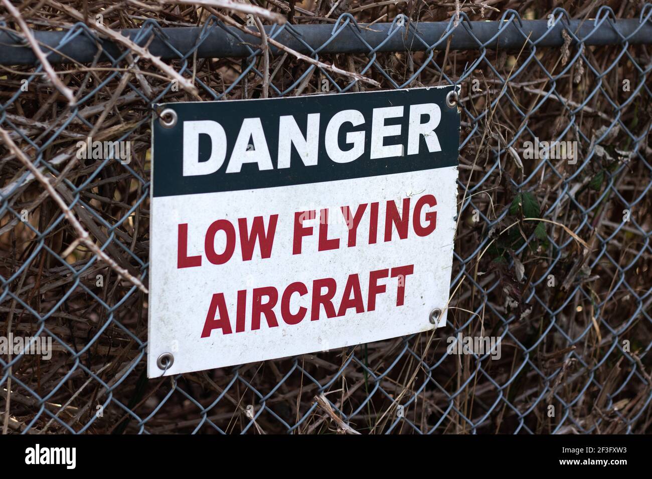 View of sign Caution Low Flying Aircraft at local airport in Courtenay ...