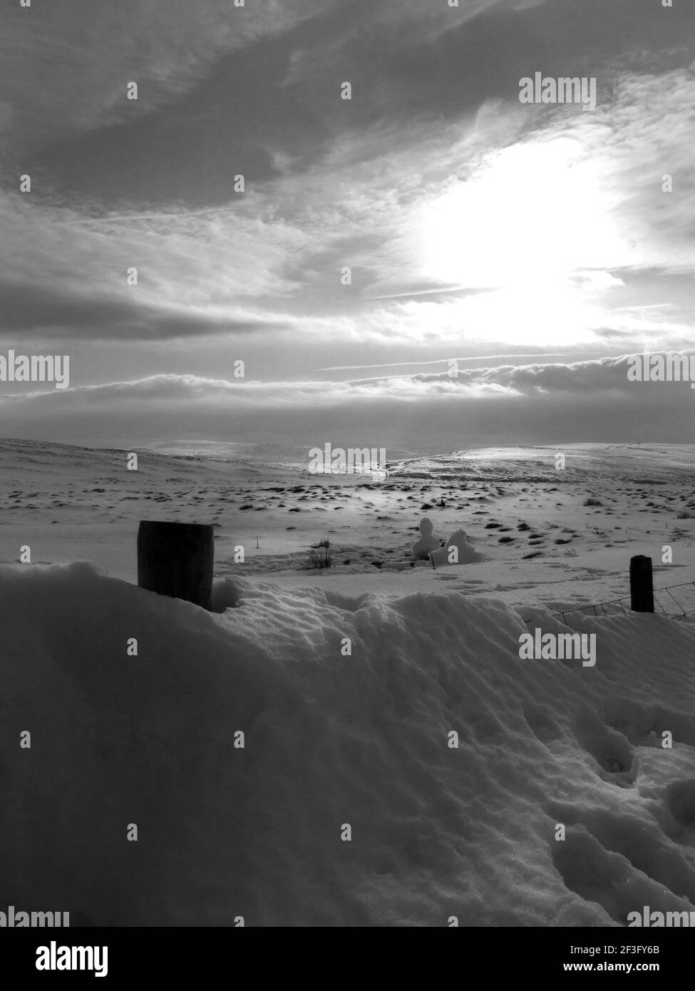 A chilling view of a winter landscape against a sunny sky background ...