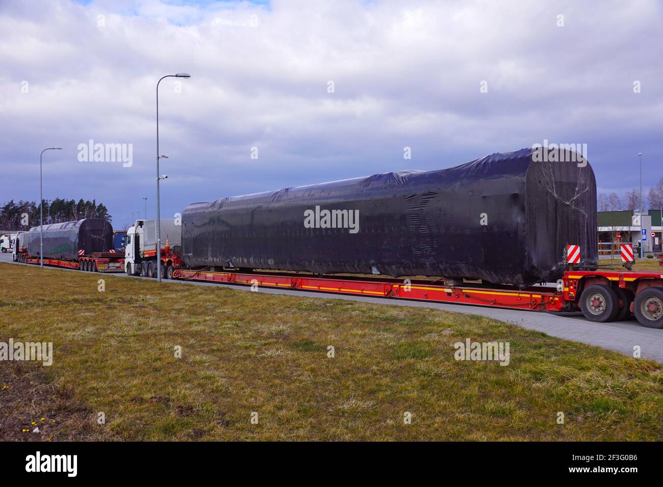 Oversize load or exceptional convoy. A truck with a special semi-trailer for transporting ...
