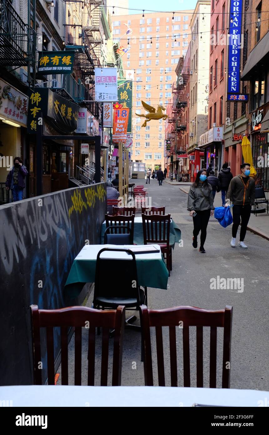 Outdoor seating of a restaurant set up on Pell Street in Manhattan ...