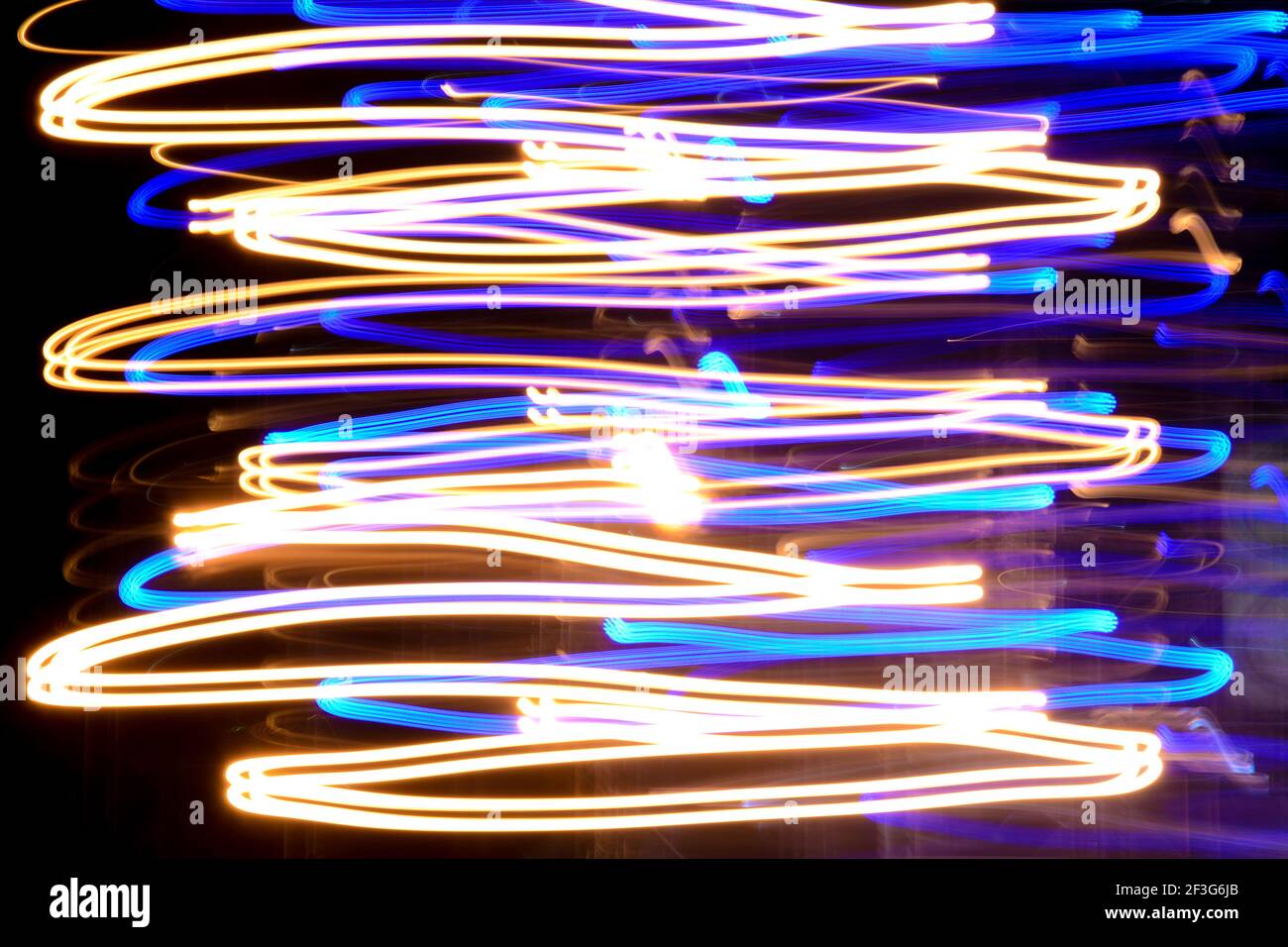 Colorful light streaks at night (long exposure shot) - abstract ...