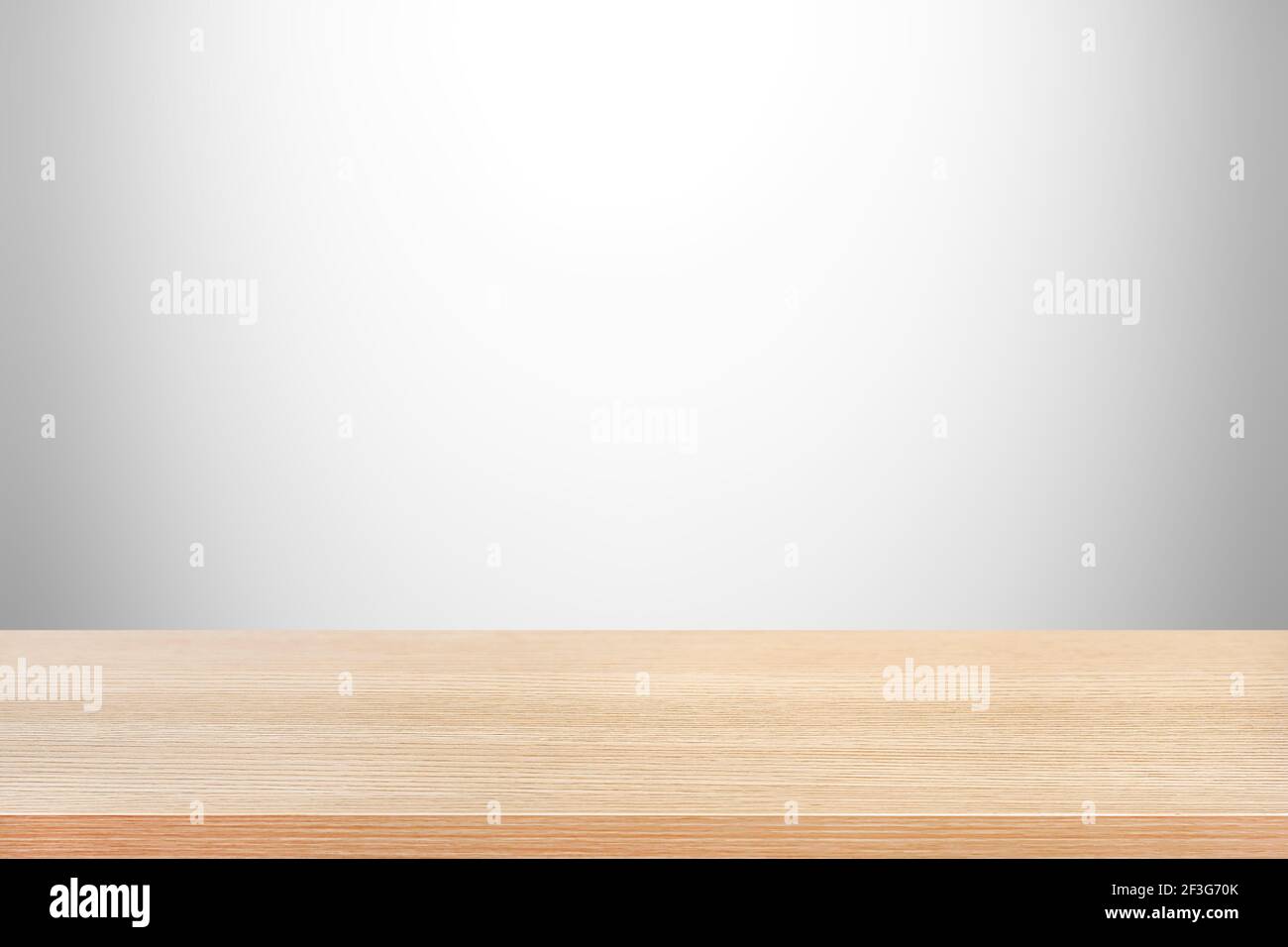 Wood table top on gray gradient background - can be used for display or ...