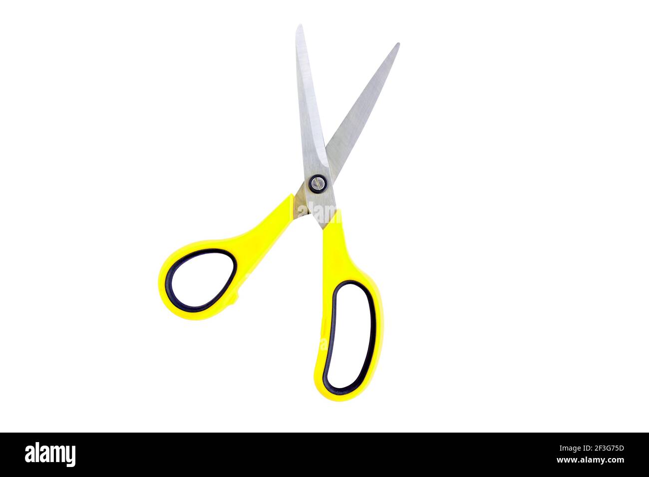 A pair of scissors with yellow plastic handles, isolated on white ...