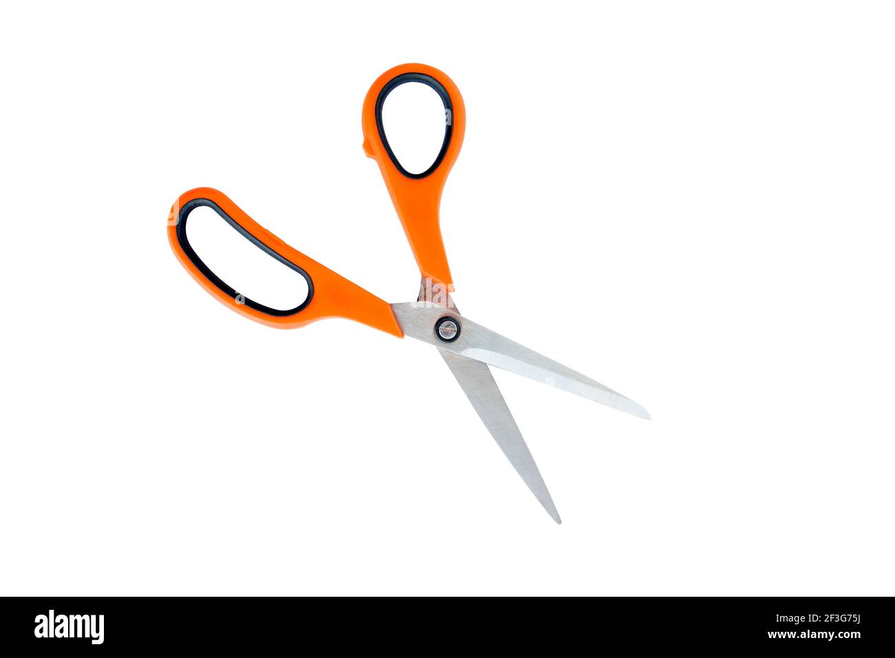 A pair of scissors with orange plastic handles, isolated on white ...