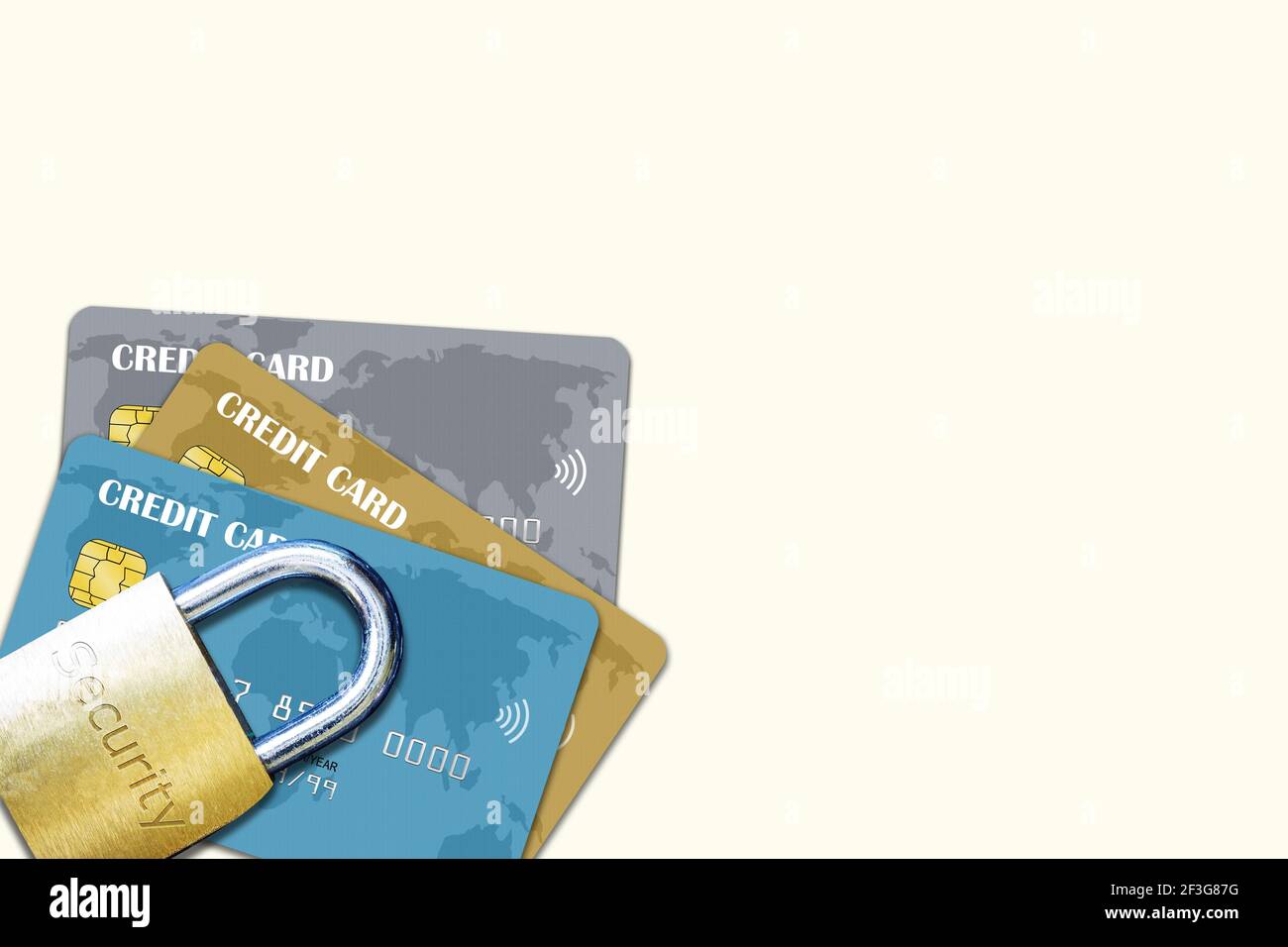 Stack of multiple credit cards with security lock on top isolated with ...