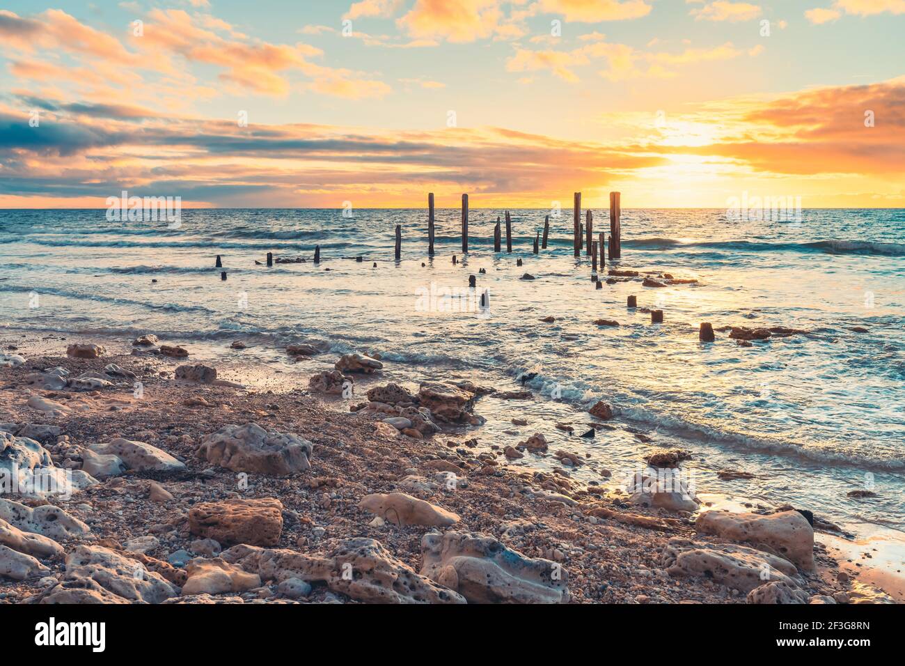 Iconic Port Willunga jetty pylons at sunset, South Australia Stock ...