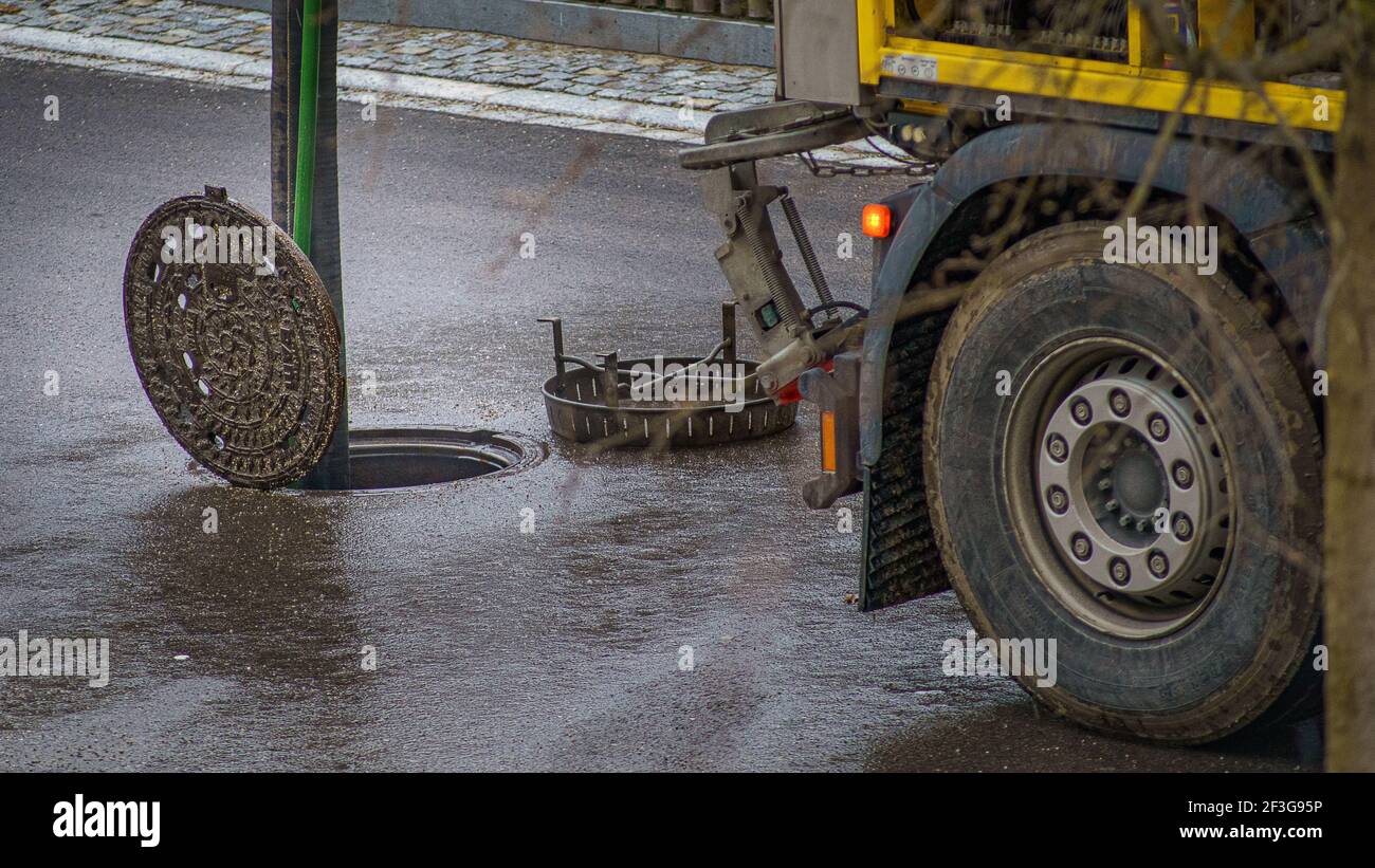 Open manhole cover in case of cleaning the drain at the open street ...