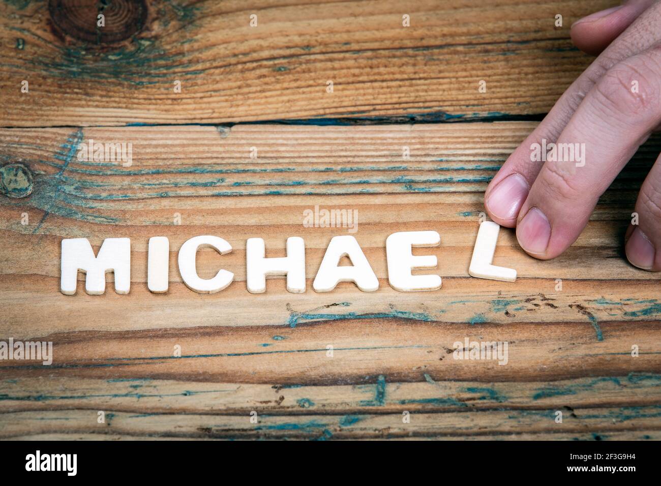 MICHAEL. Name of men and boys. Birthday concept. White letters of the ...