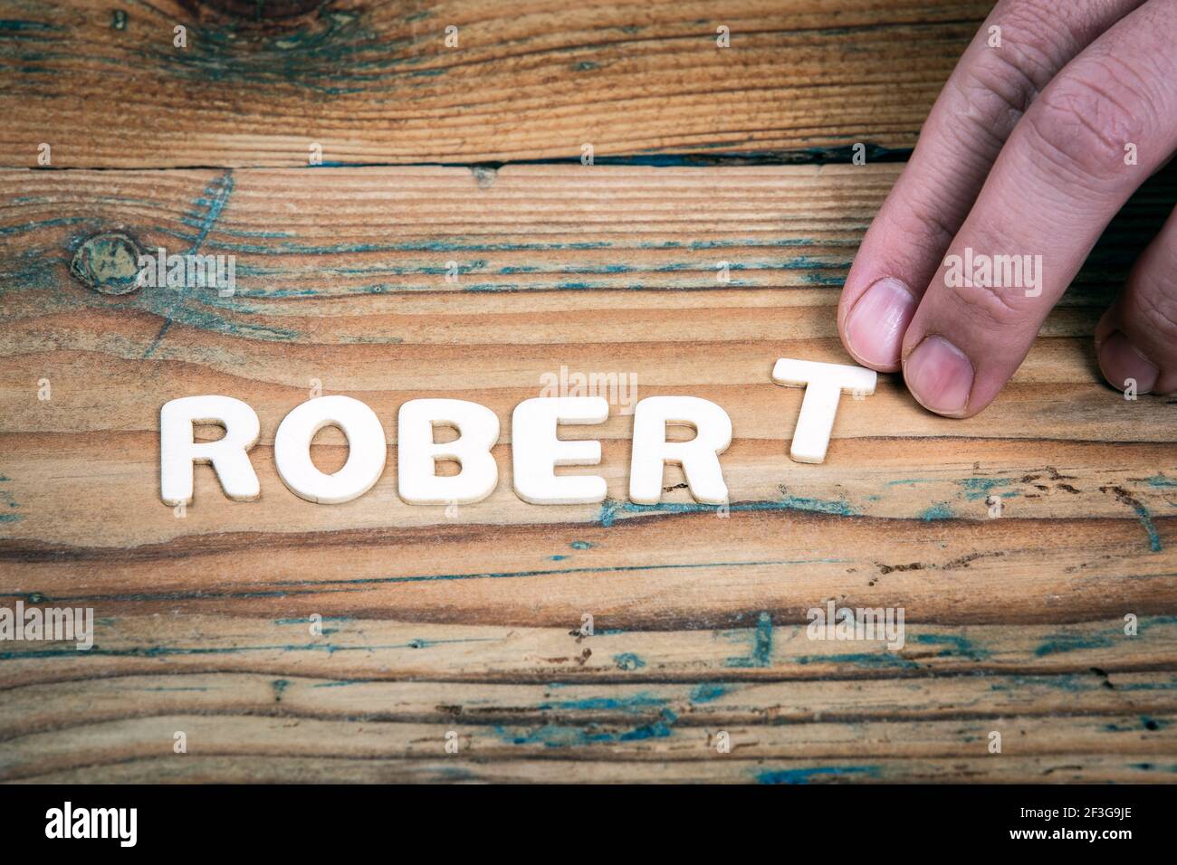 ROBERT. Name of men and boys. Birthday concept. White letters of the ...