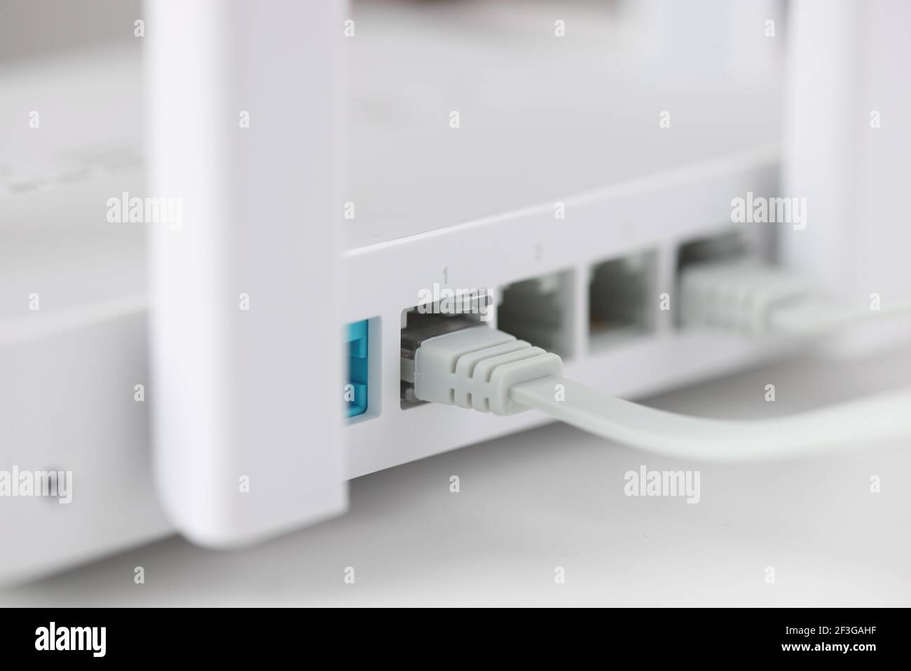 Network cable is plugged into socket of access point closeup Stock ...