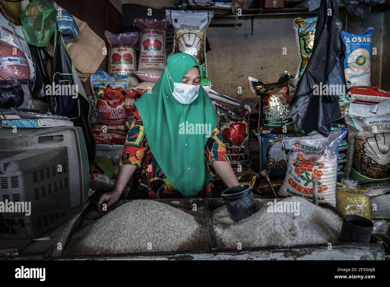 Makassar, South Sulawesi, Indonesia. 17th Mar, 2021. Rice traders in ...