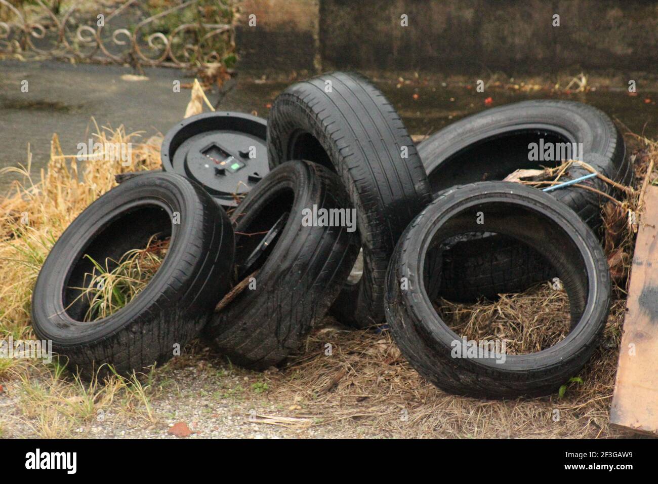 Thrown out tires hi-res stock photography and images - Alamy